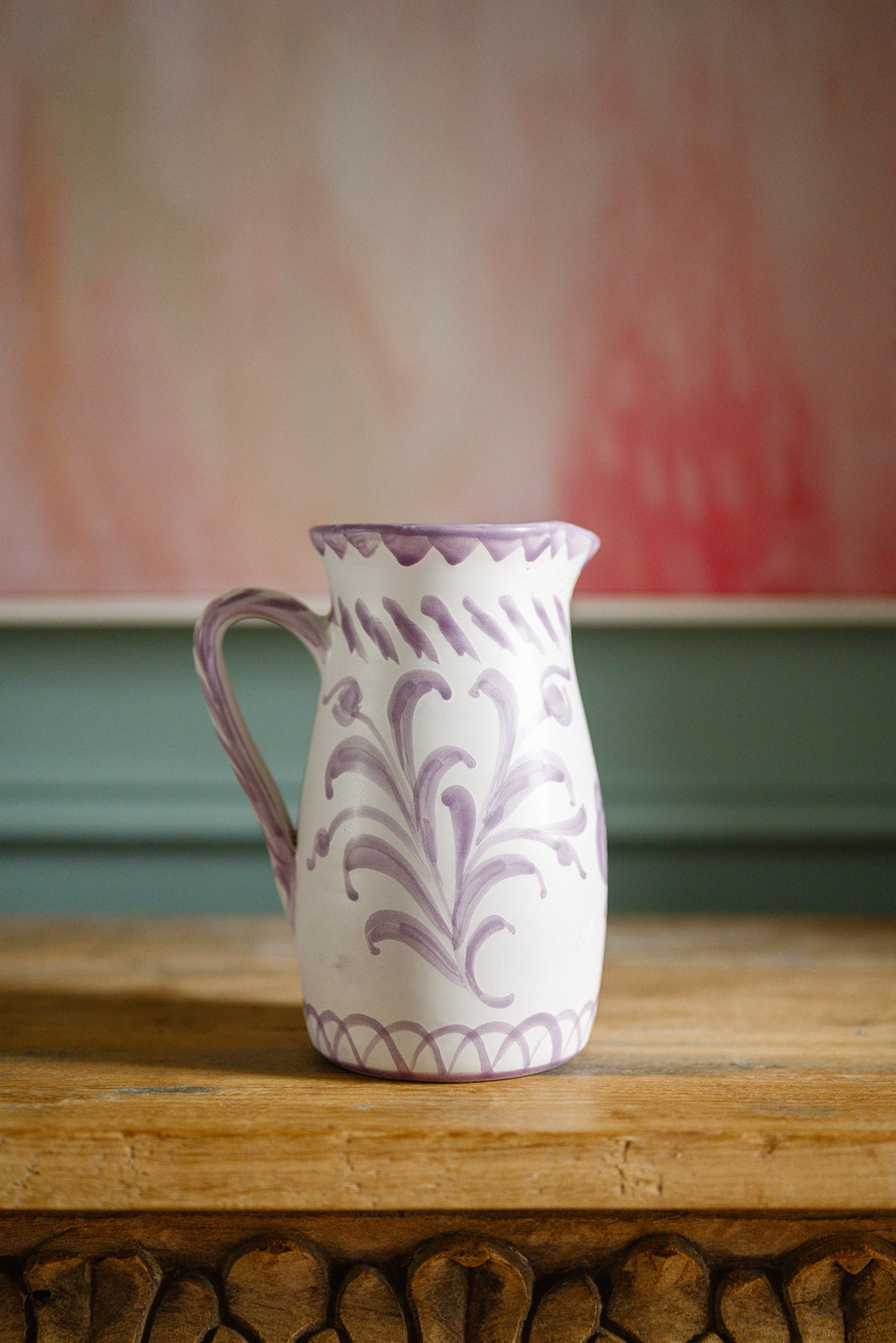 Hand-painted Spanish ceramic pitcher with lilac motif